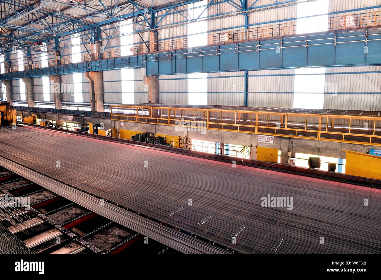--FILE--Rolls of steel products are moved on the assembly line at a ...