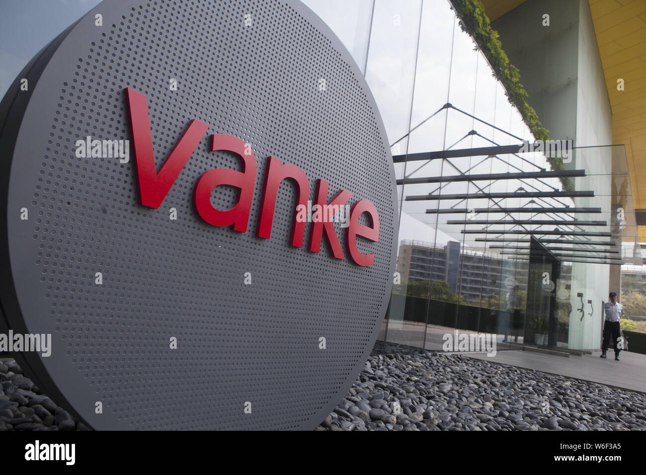--FILE--A logo of Vanke is pictured in front of the headquarters of ...