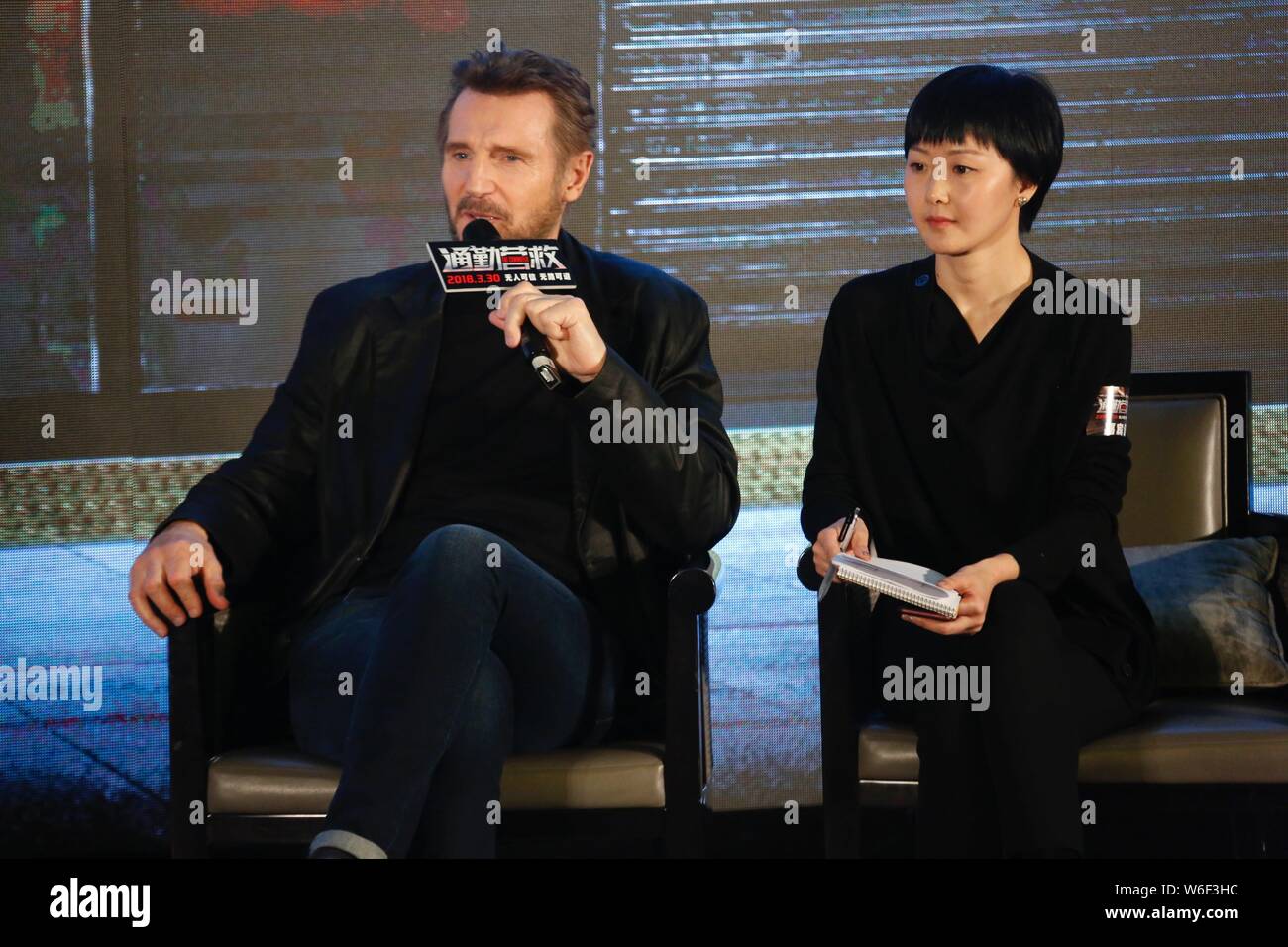 Hollywood actor Liam Neeson, left, attends a press conference for his ...