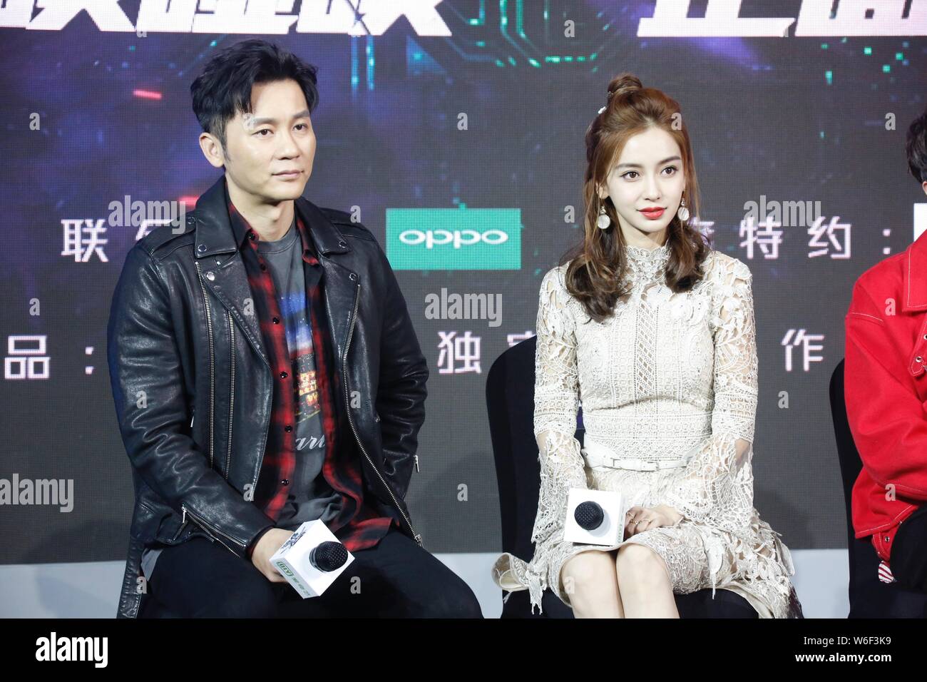 Hong Kong actress Angelababy, right, and Chinese actor Li Chen attend a ...