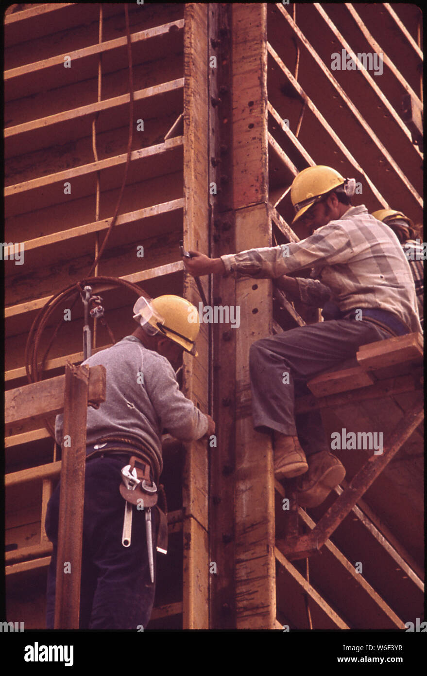 AT WORK ON PIERS FOR NEW BRIDGE THAT WILL CROSS THE BALTIMORE HARBOR AT ...