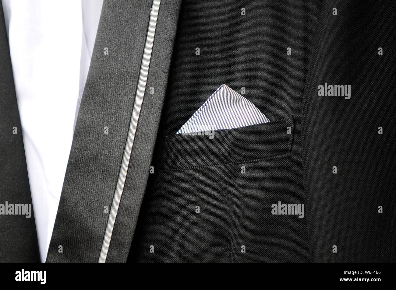 White handkerchief suit hi-res stock photography and images - Alamy