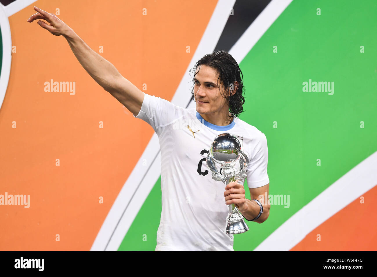 Edinson Cavani of Uruguay national football team poses with his trophy ...