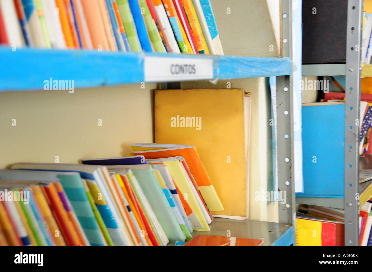 library shelf with several books Stock Photo - Alamy