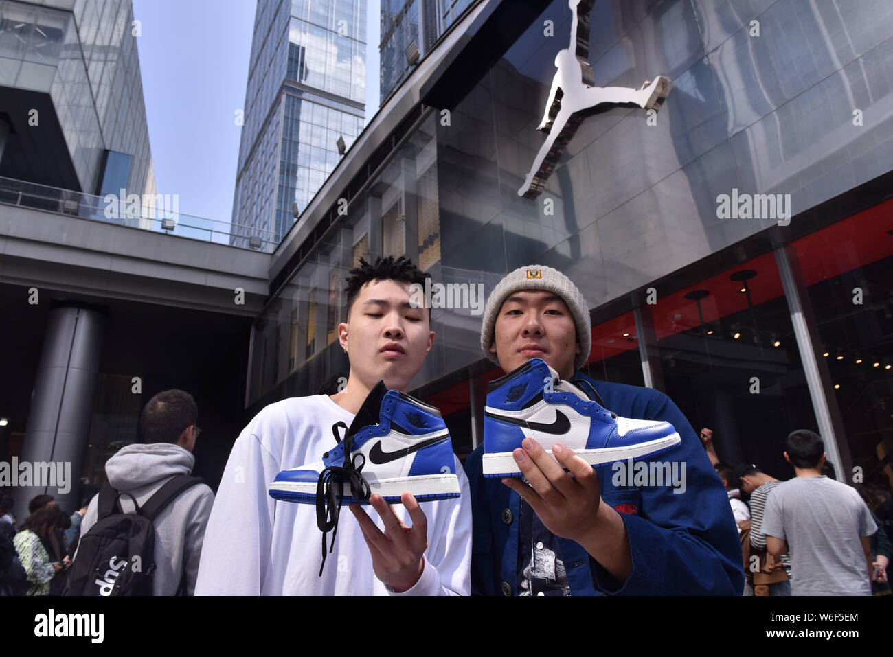 Chinese basketball and sneaker fans display the new releases they ...