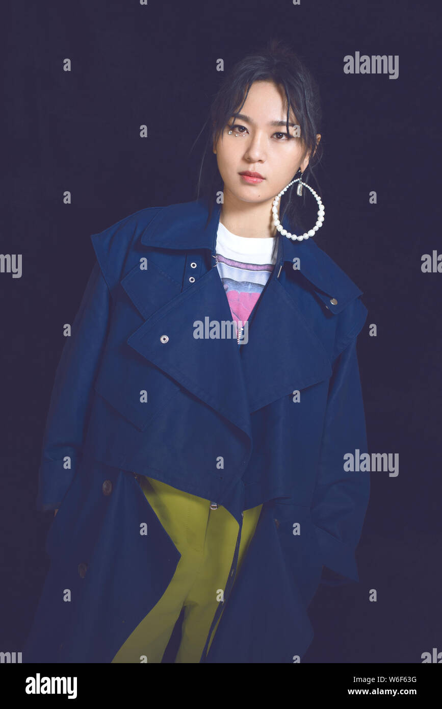 Chinese singer Zhou Bichang poses for portrait photos during an ...