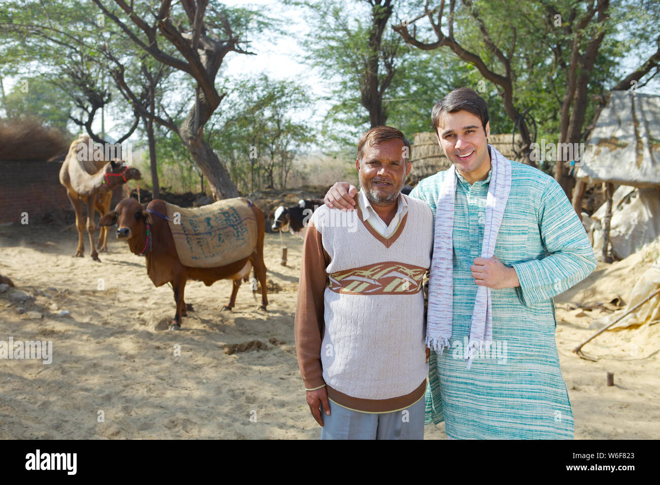 Portrait of two villagers standing together Stock Photo - Alamy