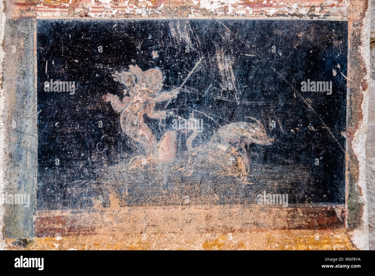 Winged Amorino leads a fish-drawn chariot, a figure of divinity of ...