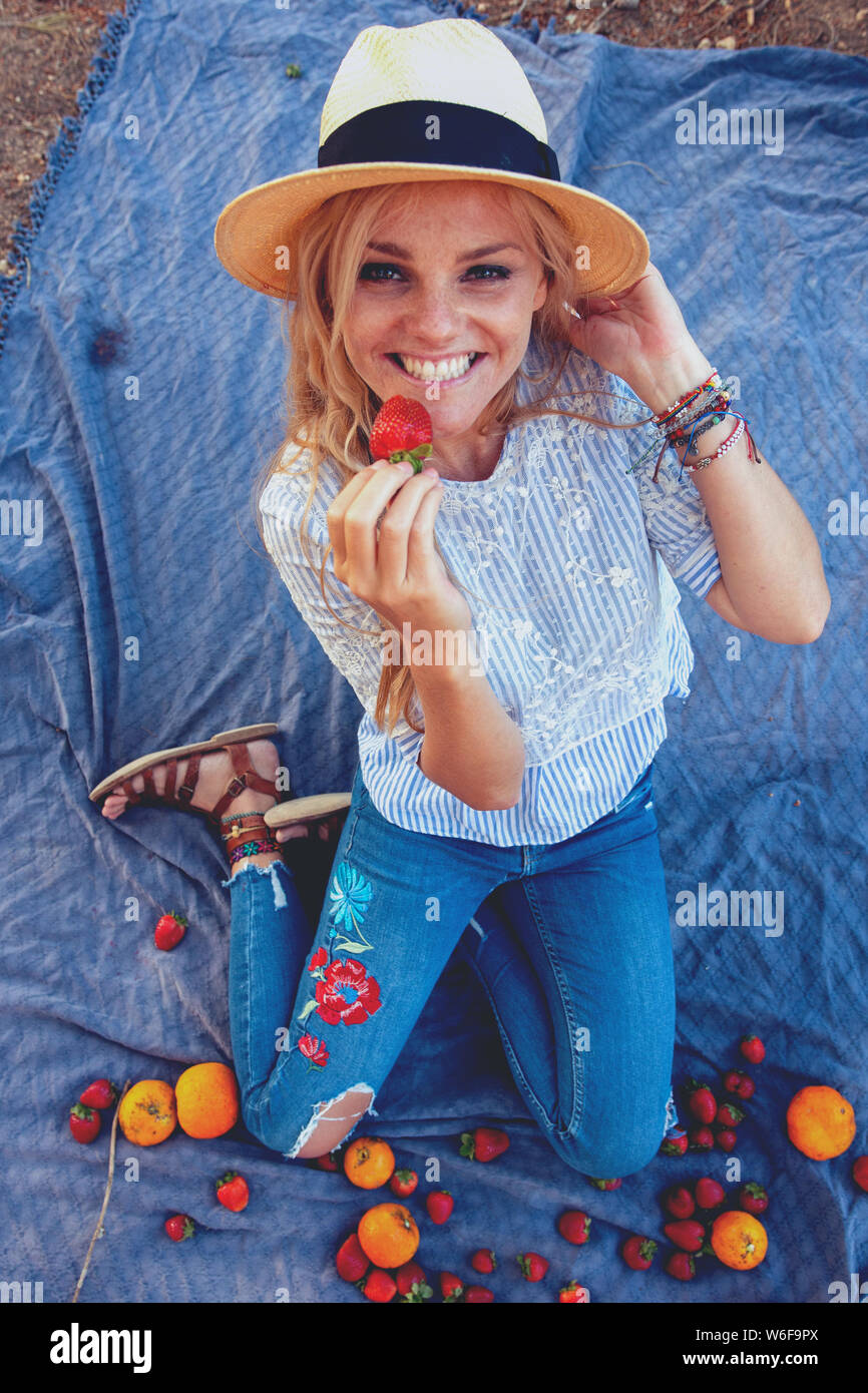 Woman eating hat hi-res stock photography and images - Alamy