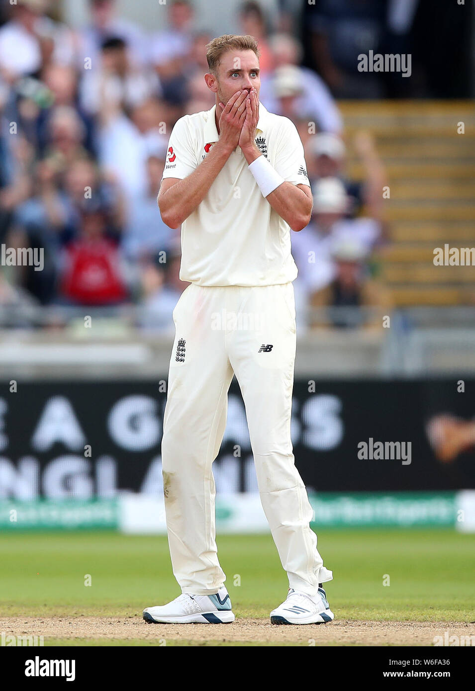 England's Stuart Broad celebrates taking the wicket of Australia's Tim ...