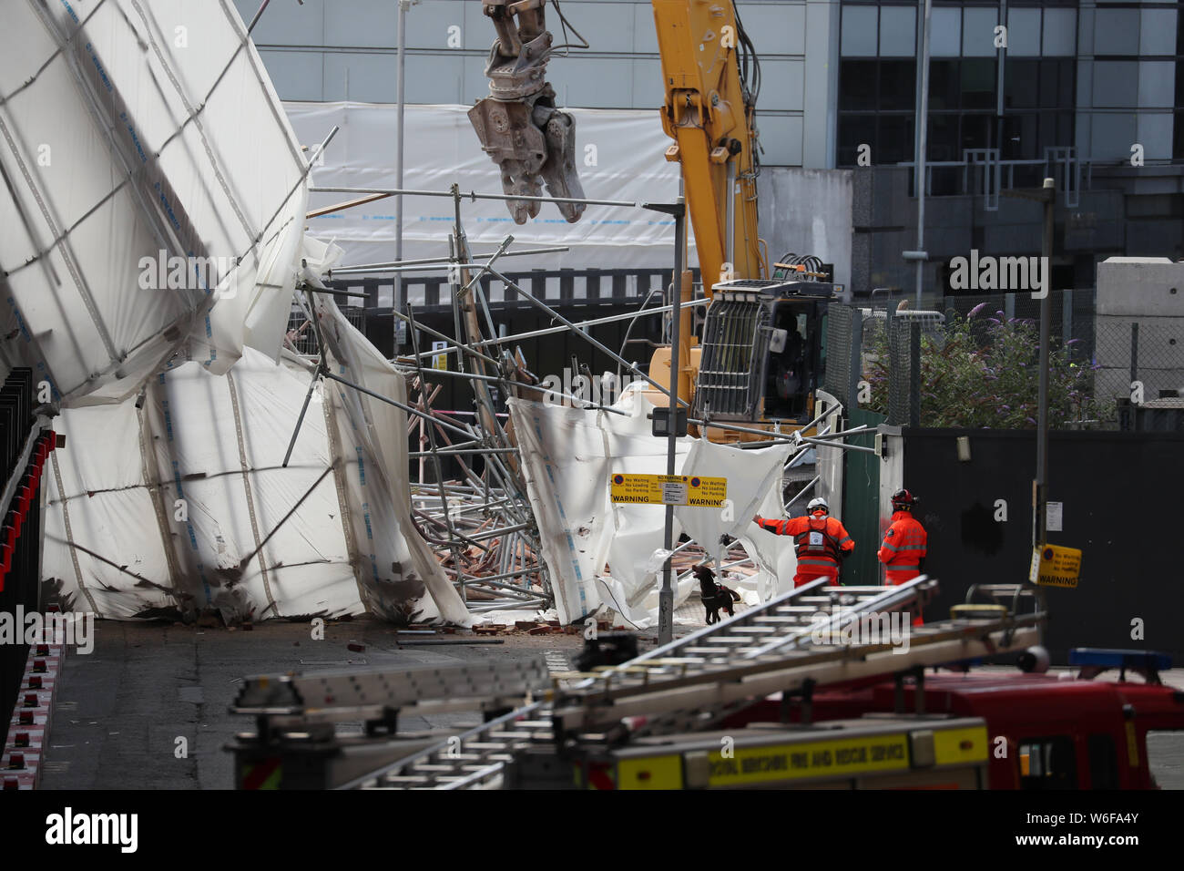 Emergency personnel at the scene of collapsed scaffolding in Garrard ...