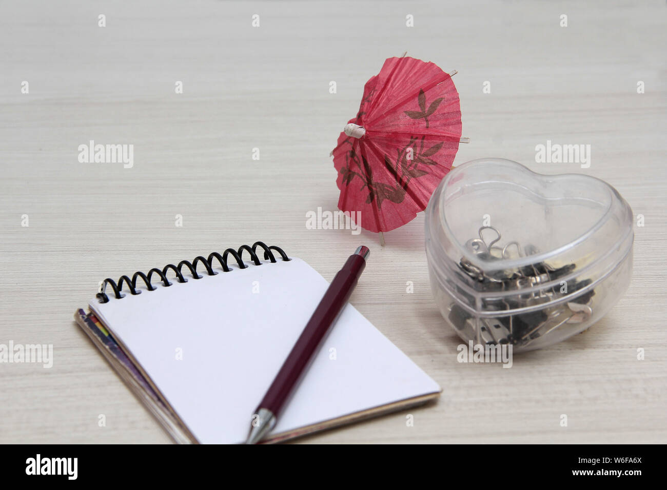 notebook on the table with notepad Stock Photo - Alamy