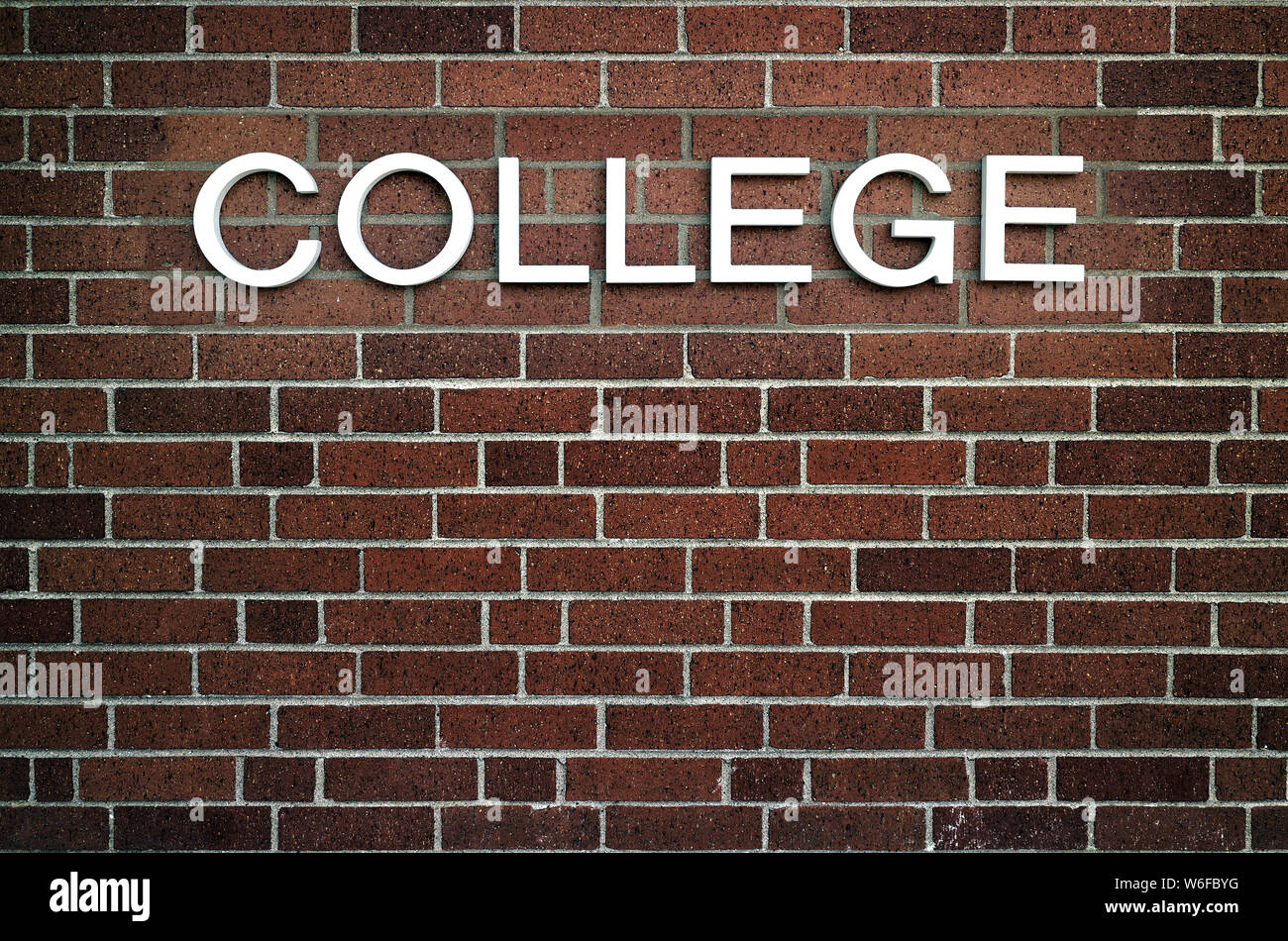 glowing college word on the rustic brick wall Stock Photo - Alamy