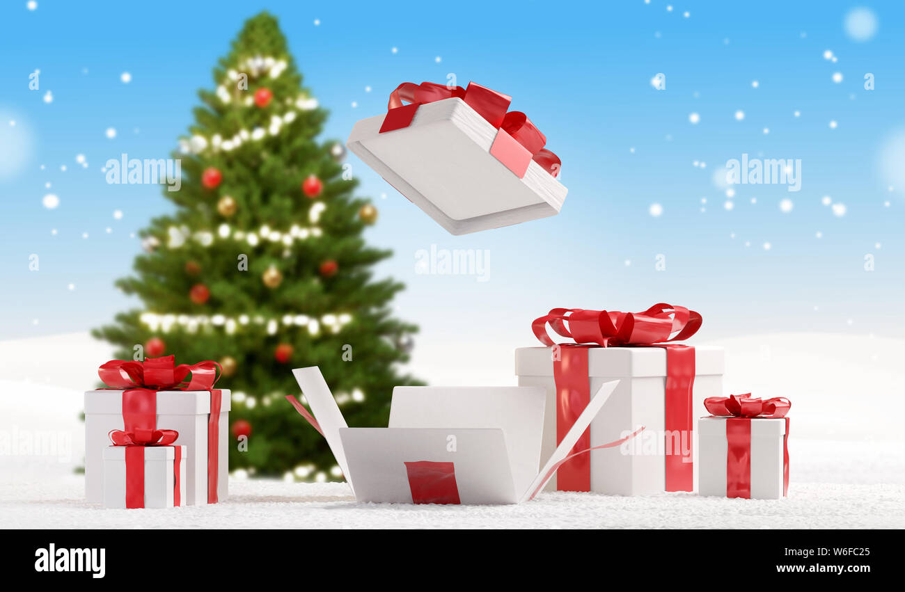 gifts for Christmas with opened christmas present and fir tree and snow ...