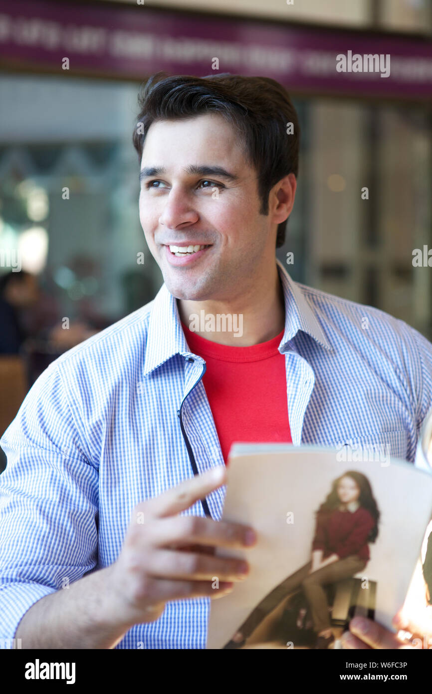 Happiness in magazines hi-res stock photography and images - Alamy