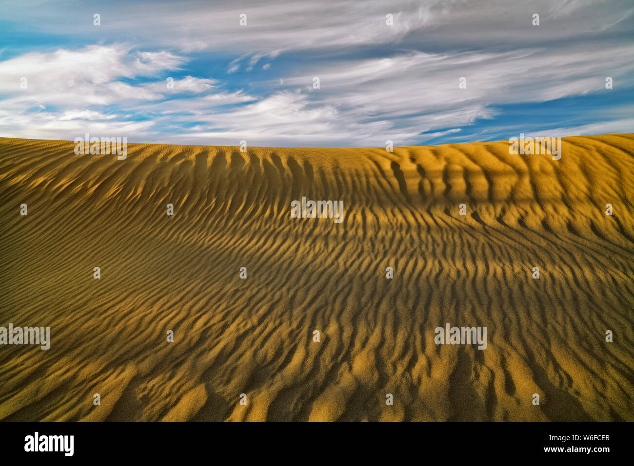 Late evening sunbreaks illuminate Golden Canyon Badlands from Zabriskie ...