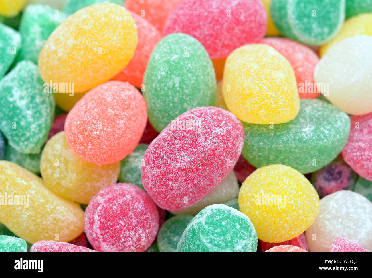 many colorful gummy candies for background use Stock Photo - Alamy