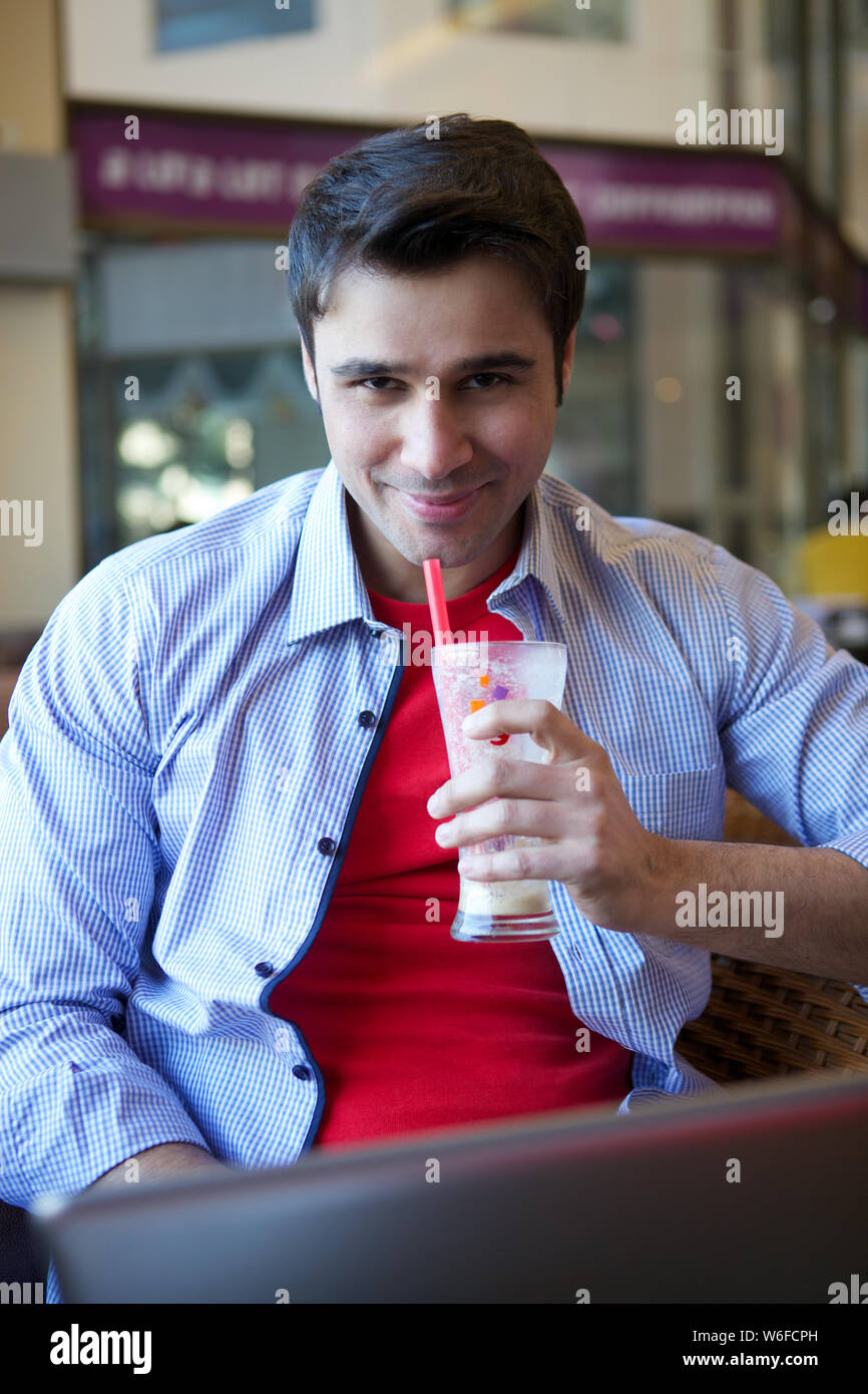 Black man drinking milkshake hi-res stock photography and images - Alamy