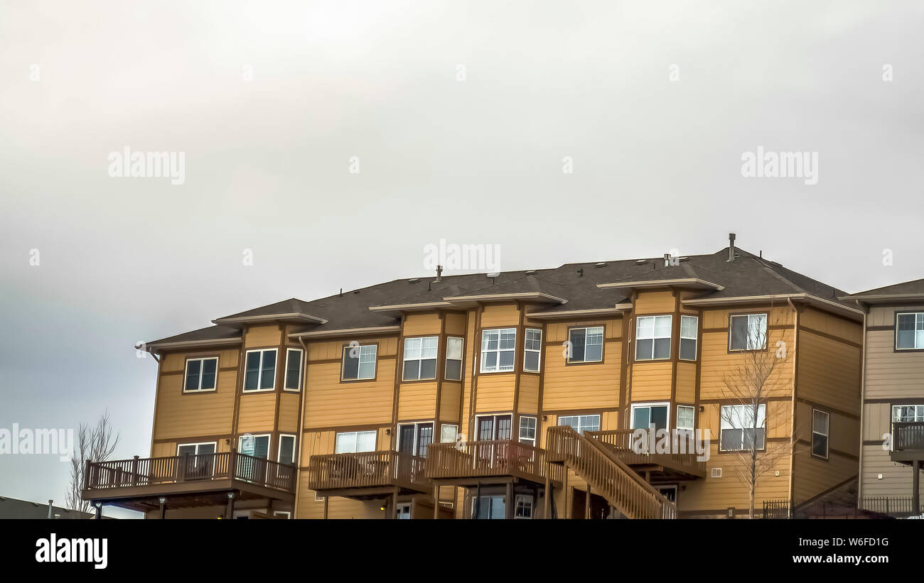 Panorama frame Homes with balconies and half hexagon shaped windows ...