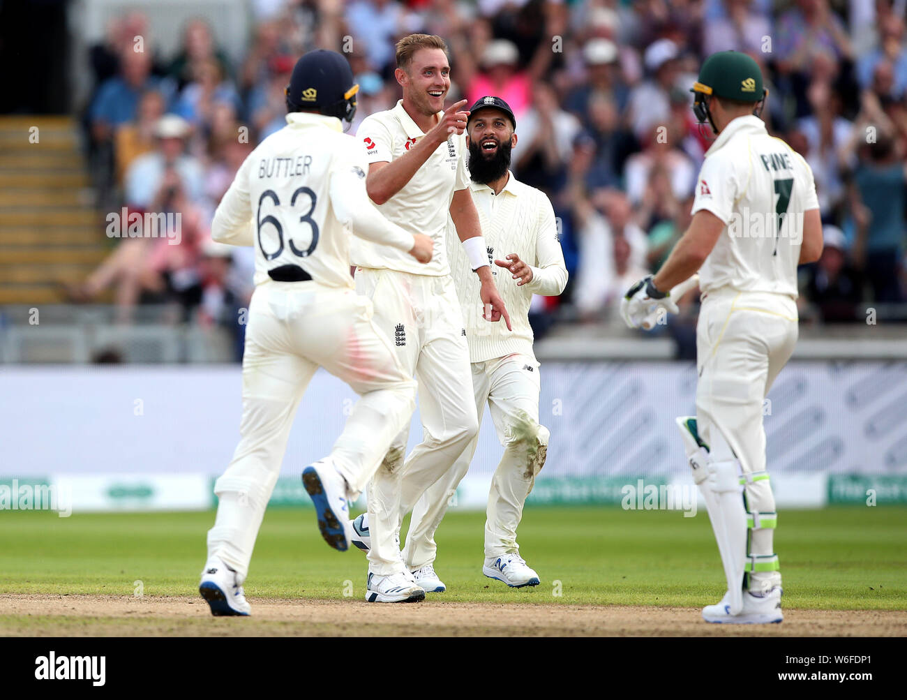 England's Stuart Broad celebrates taking the wicket of Australia's Tim ...