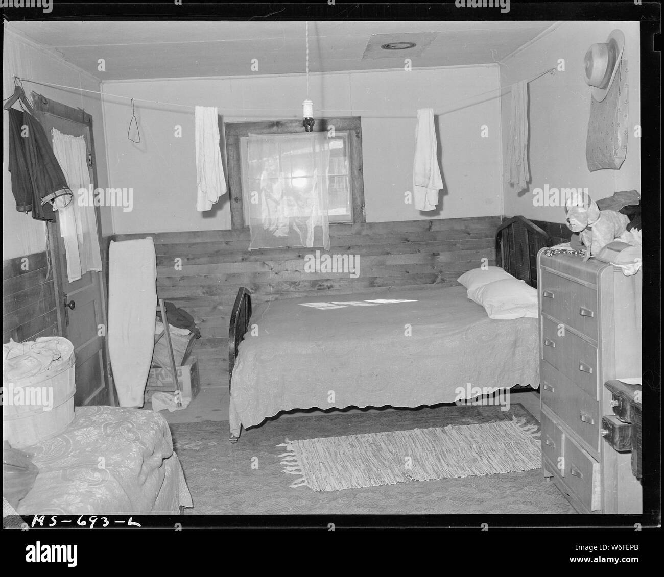 Bedroom in home of Ben Baker, miner, living in company housing project ...
