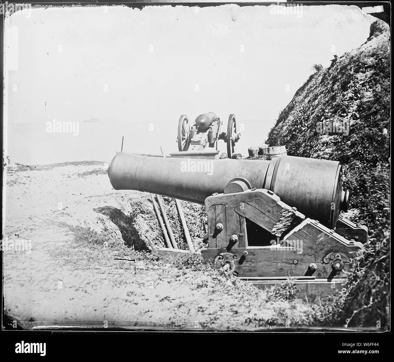 Big Guns near Ft. Sumter, S.C; The foreground weapon is a 10-inch Model 1844 columbiad, banded ...