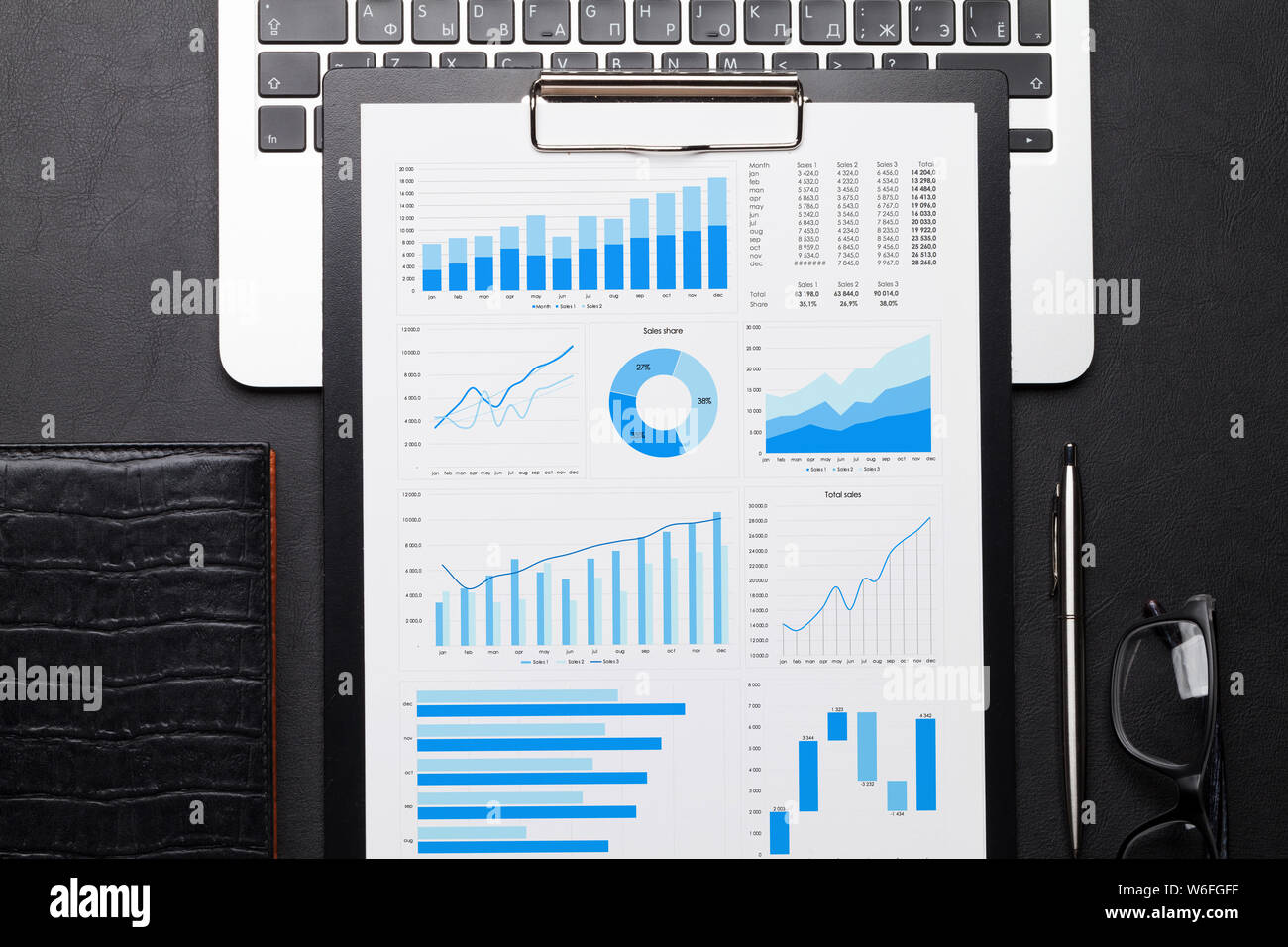 Office workplace table with charts report, supplies and laptop. Flat ...