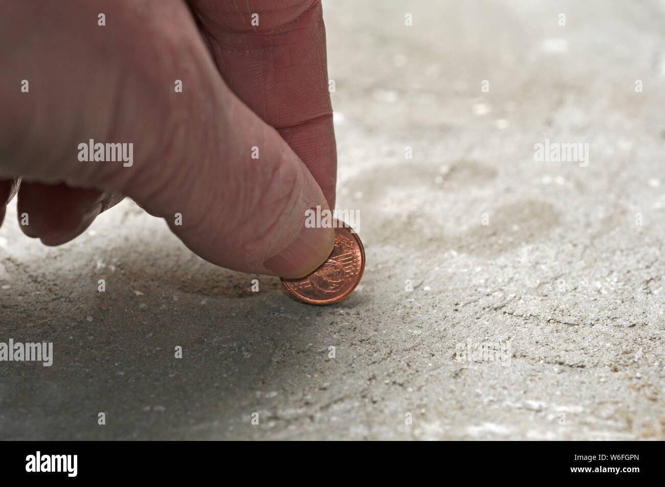 Picking up money floor hi-res stock photography and images - Alamy