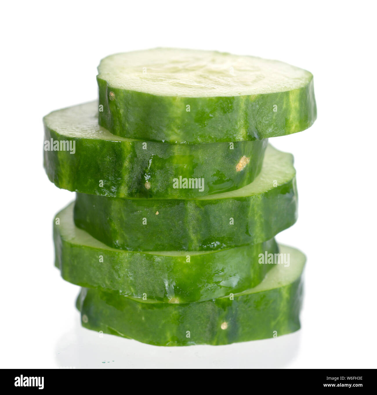 stack of pickle cucumber isolated on white Stock Photo - Alamy