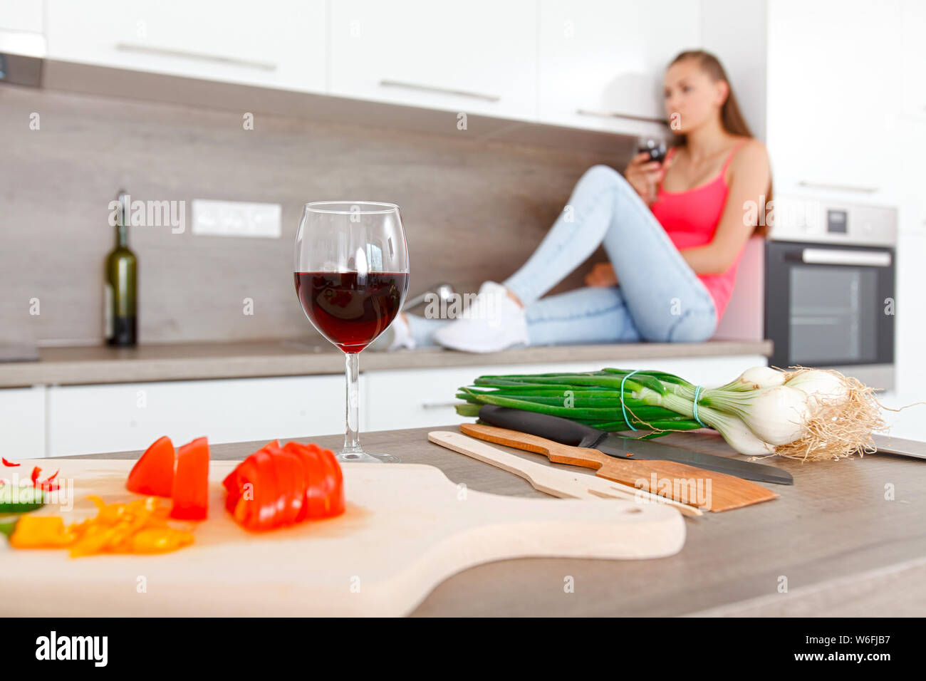 Young woman solves problems with alcohol. Alcohol addiction. (Color ...