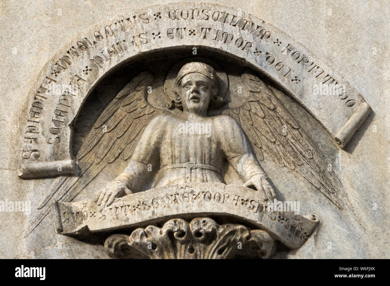 medieval bas relief adorning the wall of the Como cathedral Stock Photo ...