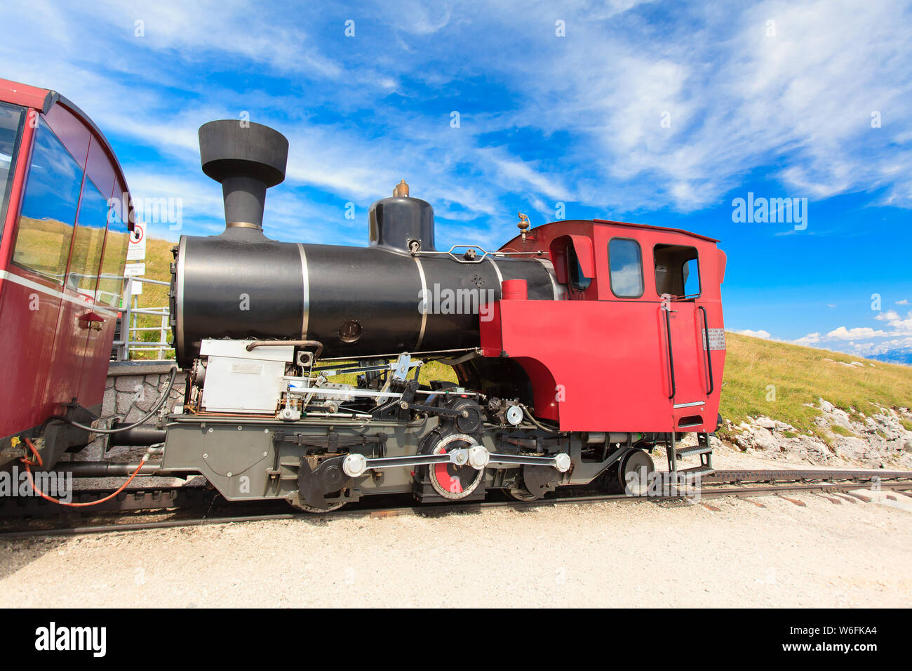 The steam train takes tourists on a mountain peak in the Austrian Alps ...