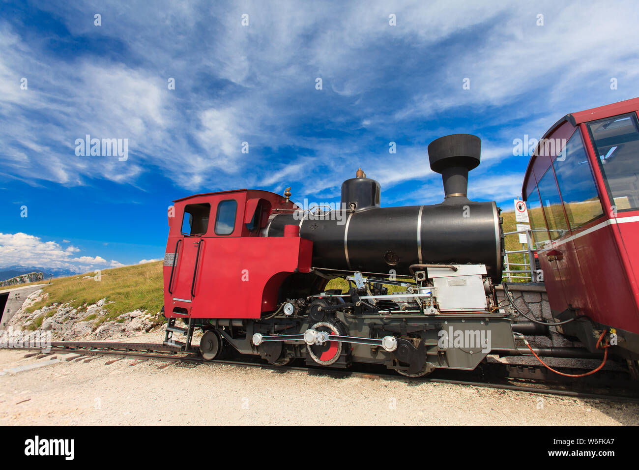 The steam train takes tourists on a mountain peak in the Austrian Alps ...