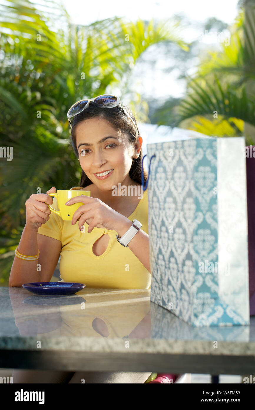 Woman tea bag smile hi-res stock photography and images - Alamy