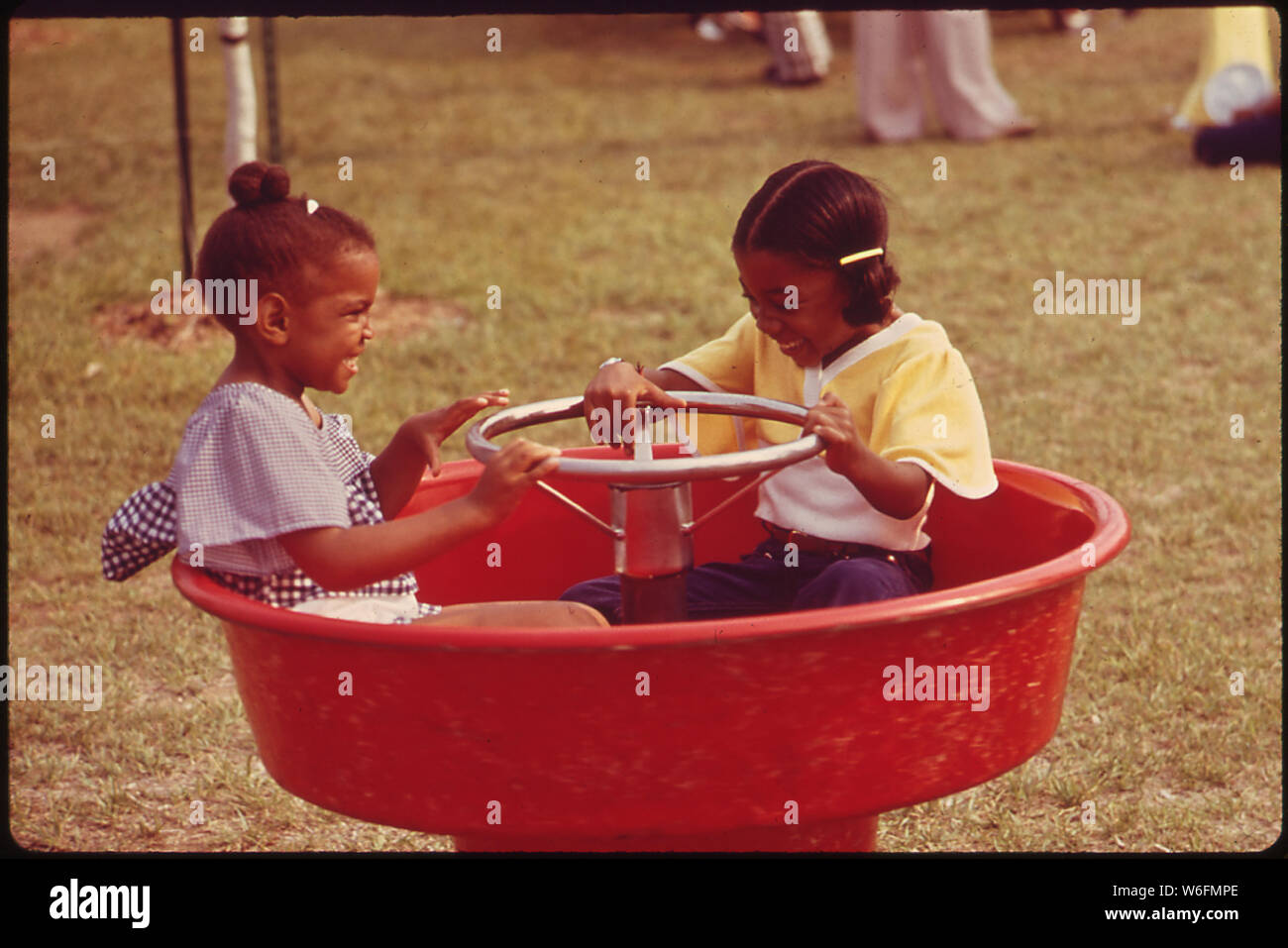 CHILDREN PLAYING IN THE PARK THAT IS NEAR THE U.S.S CONSTITUTION IN ...