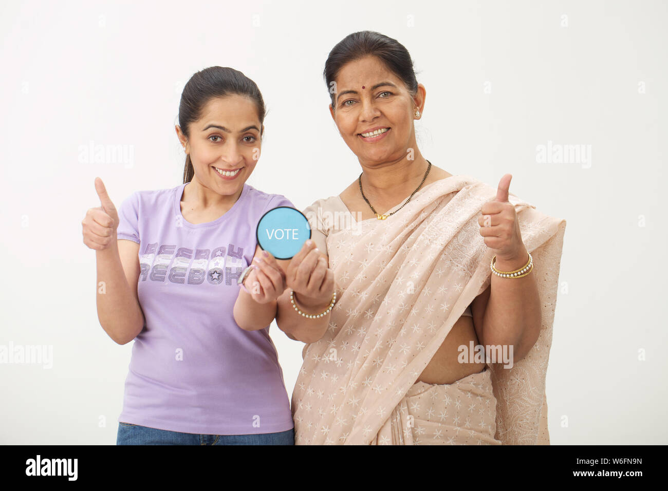 Mother and daughter voting hi-res stock photography and images - Alamy