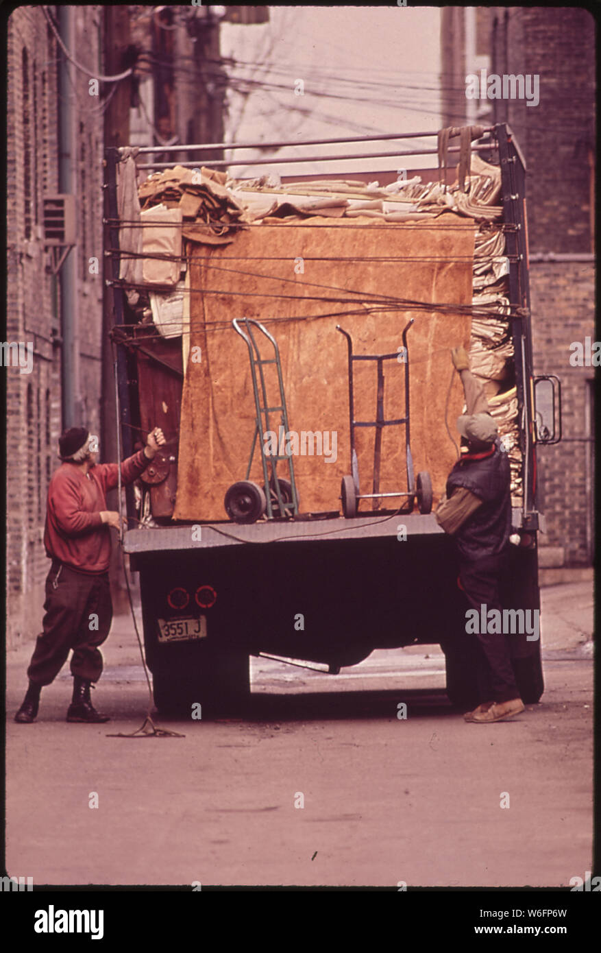 COLLECTING OLD PAPERS Stock Photo - Alamy