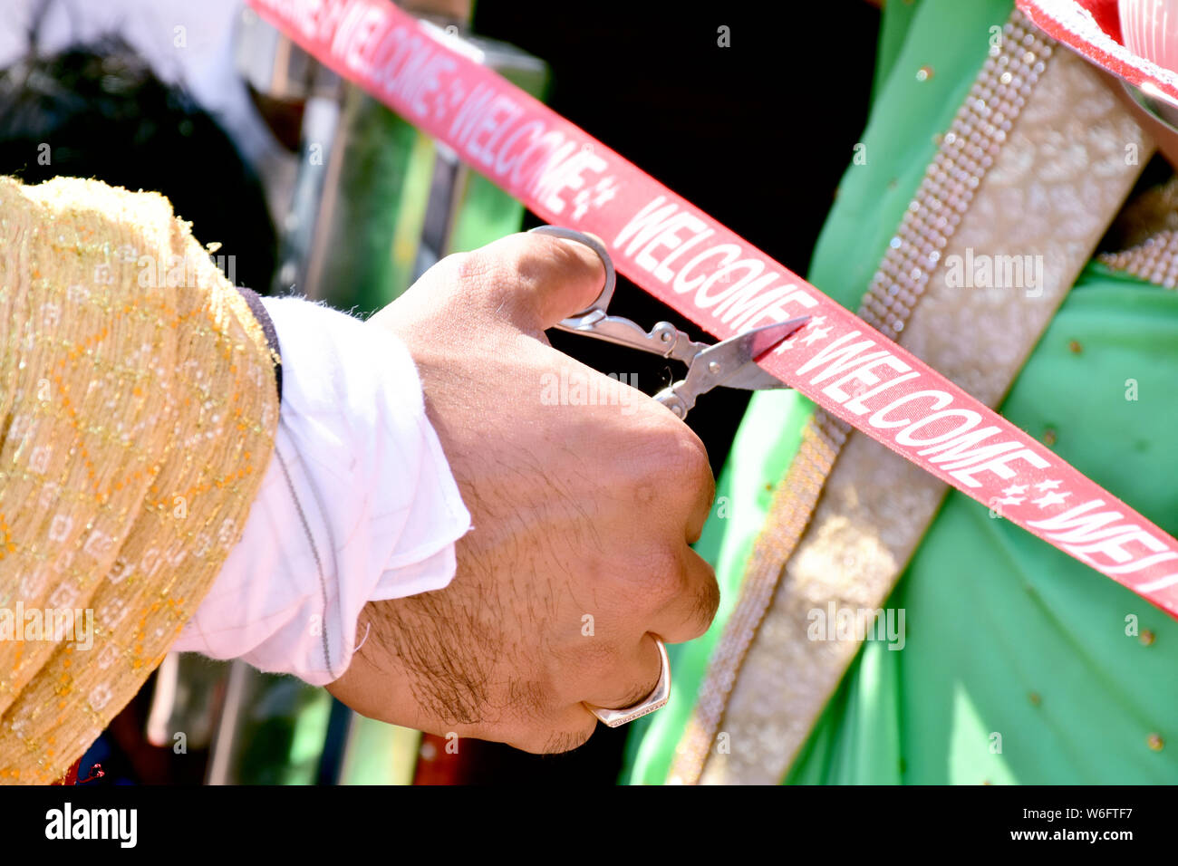 Cutting Ribbon in Indian Wedding Ritual Welcome Ceremony Stock Photo ...