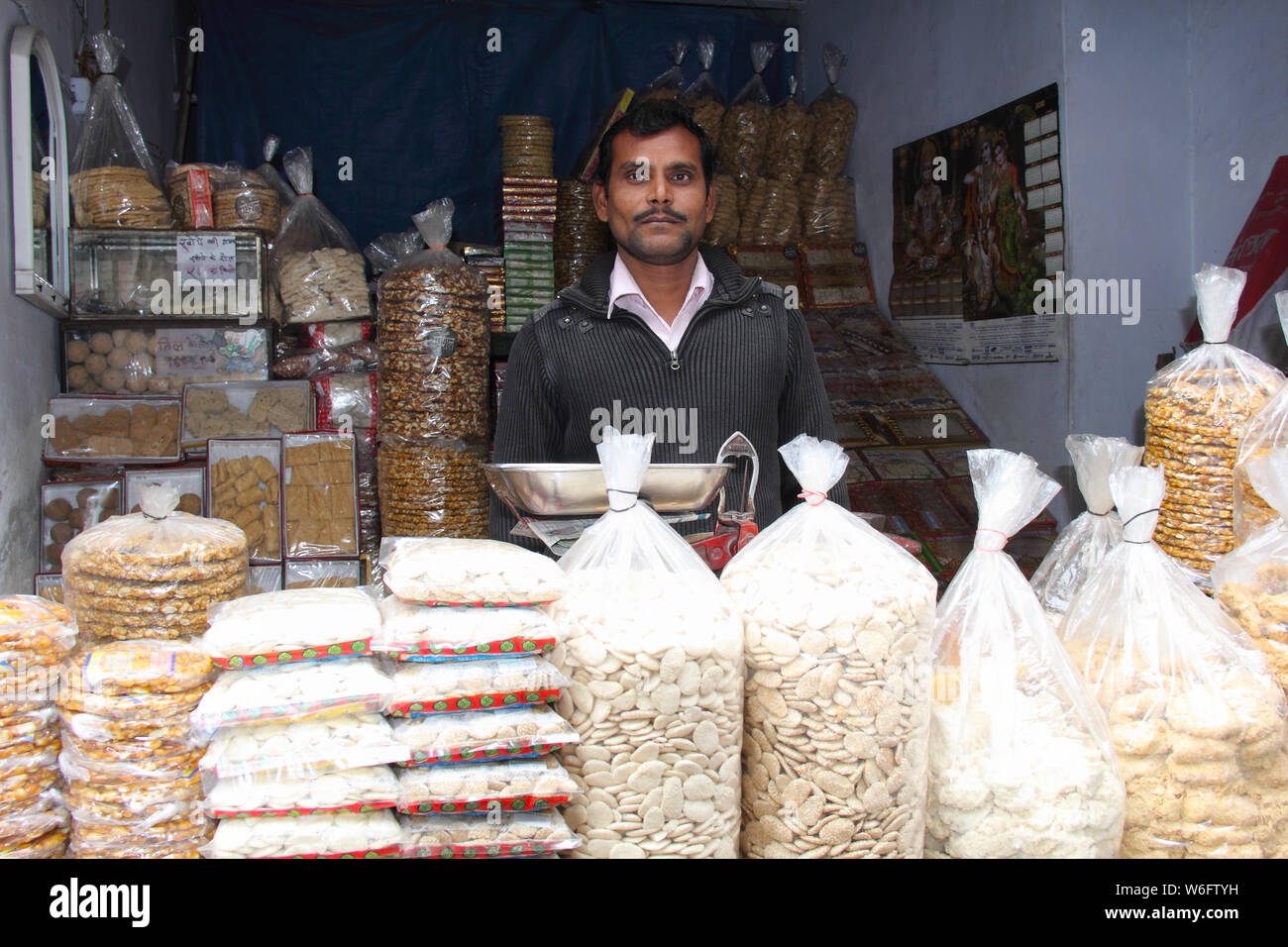 Shopkeeper Selling High Resolution Stock Photography and Images - Alamy