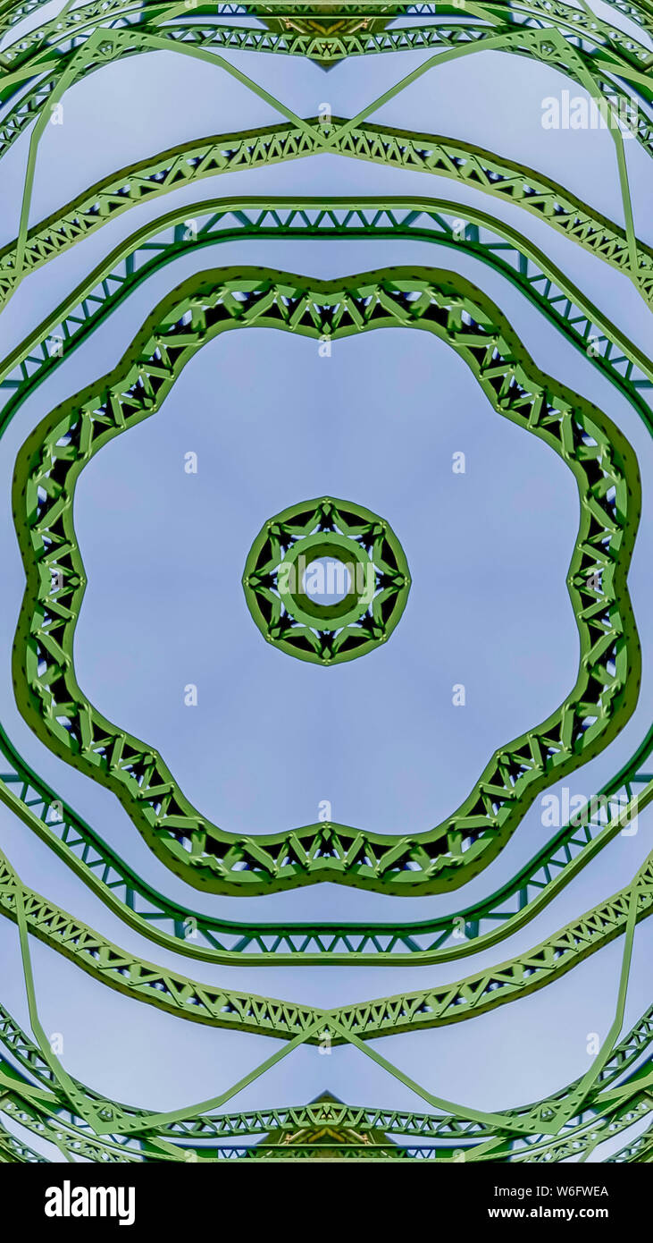 Vertical frame Circular green metal bars created using reflections in a ...