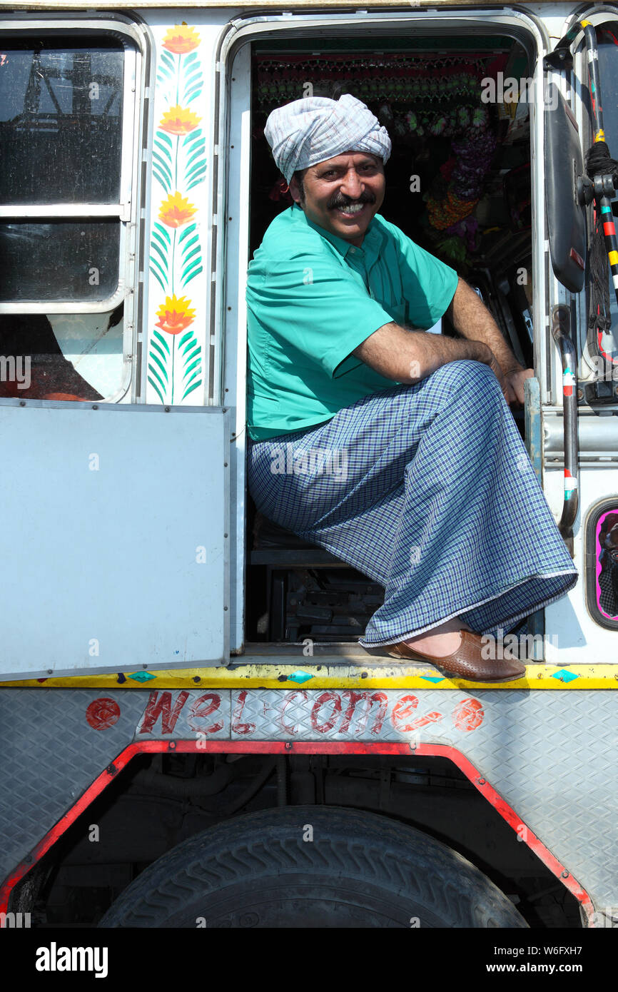 Truck driver sitting in a truck Stock Photo - Alamy