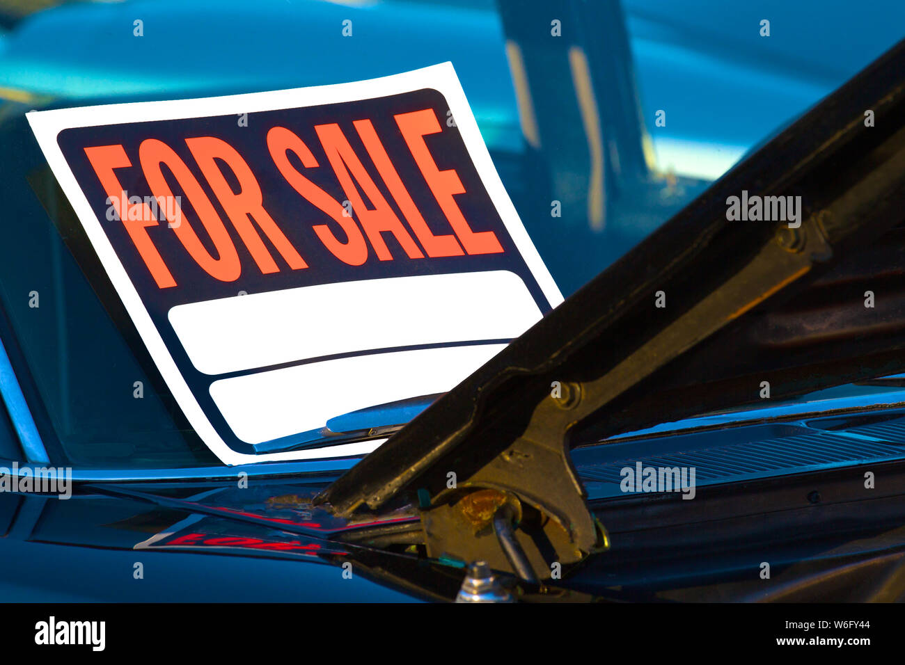 Clean background For Sale sign mounted on car windshield Stock Photo ...