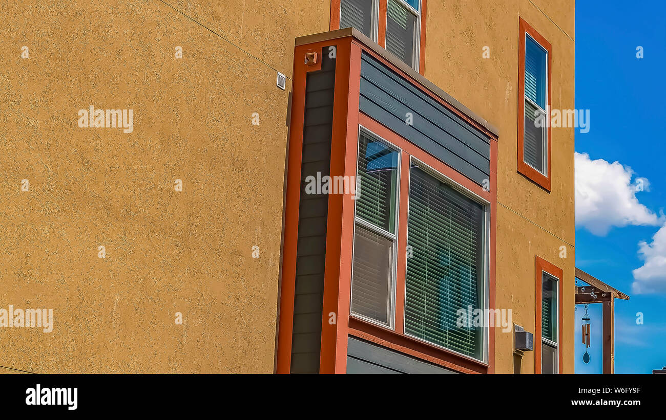 Panorama frame Residential building with a window protruding from the ...