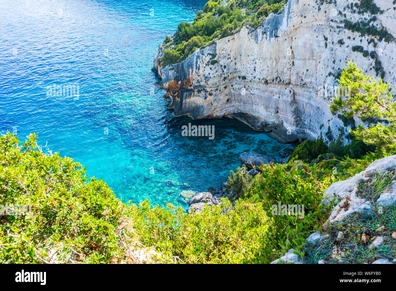 Greece, Zakynthos, Above white cliff wall and beautiful azure ocean ...
