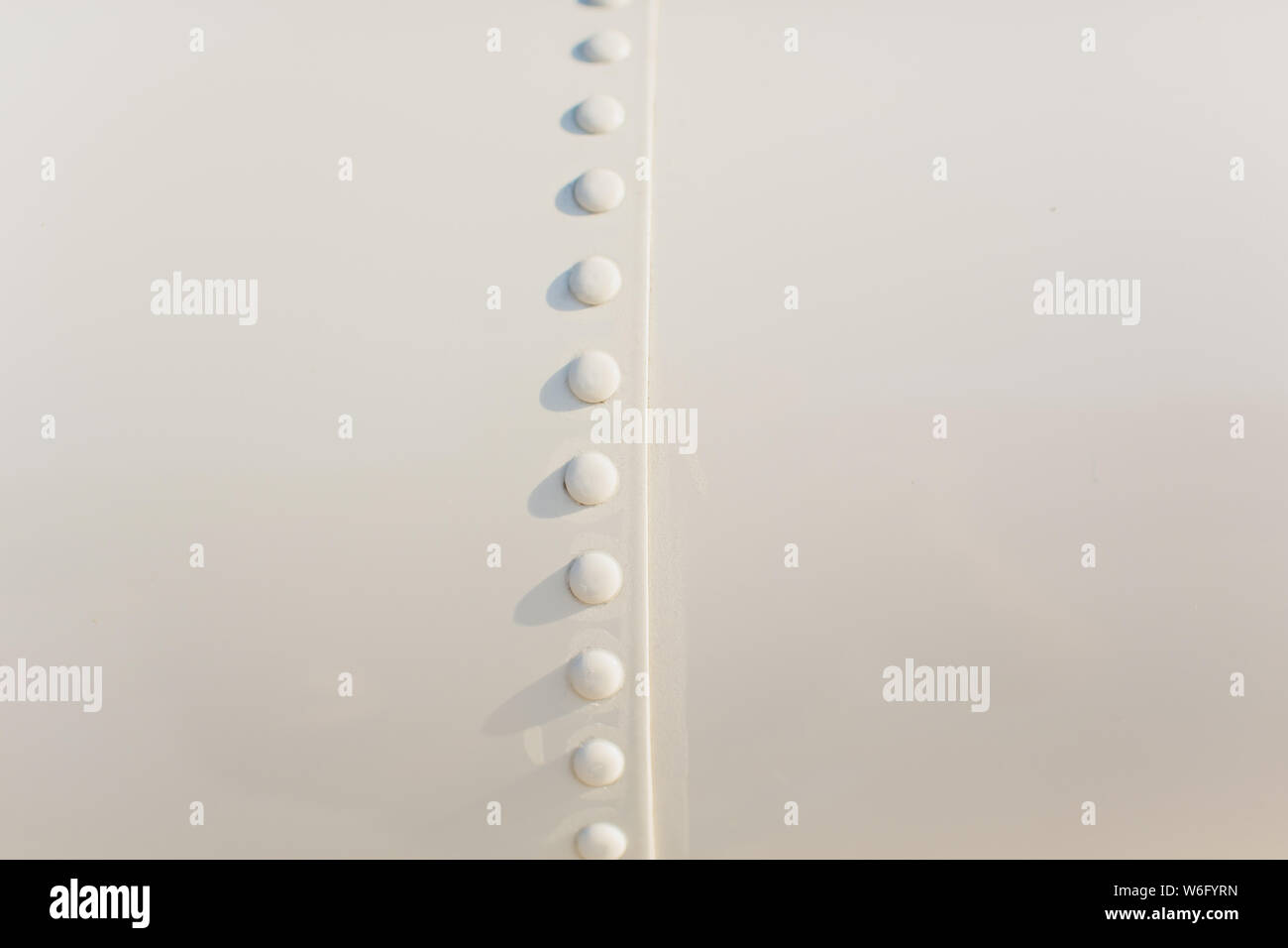Sheathing with rivets aircraft. Frame, background. bolts Stock Photo ...