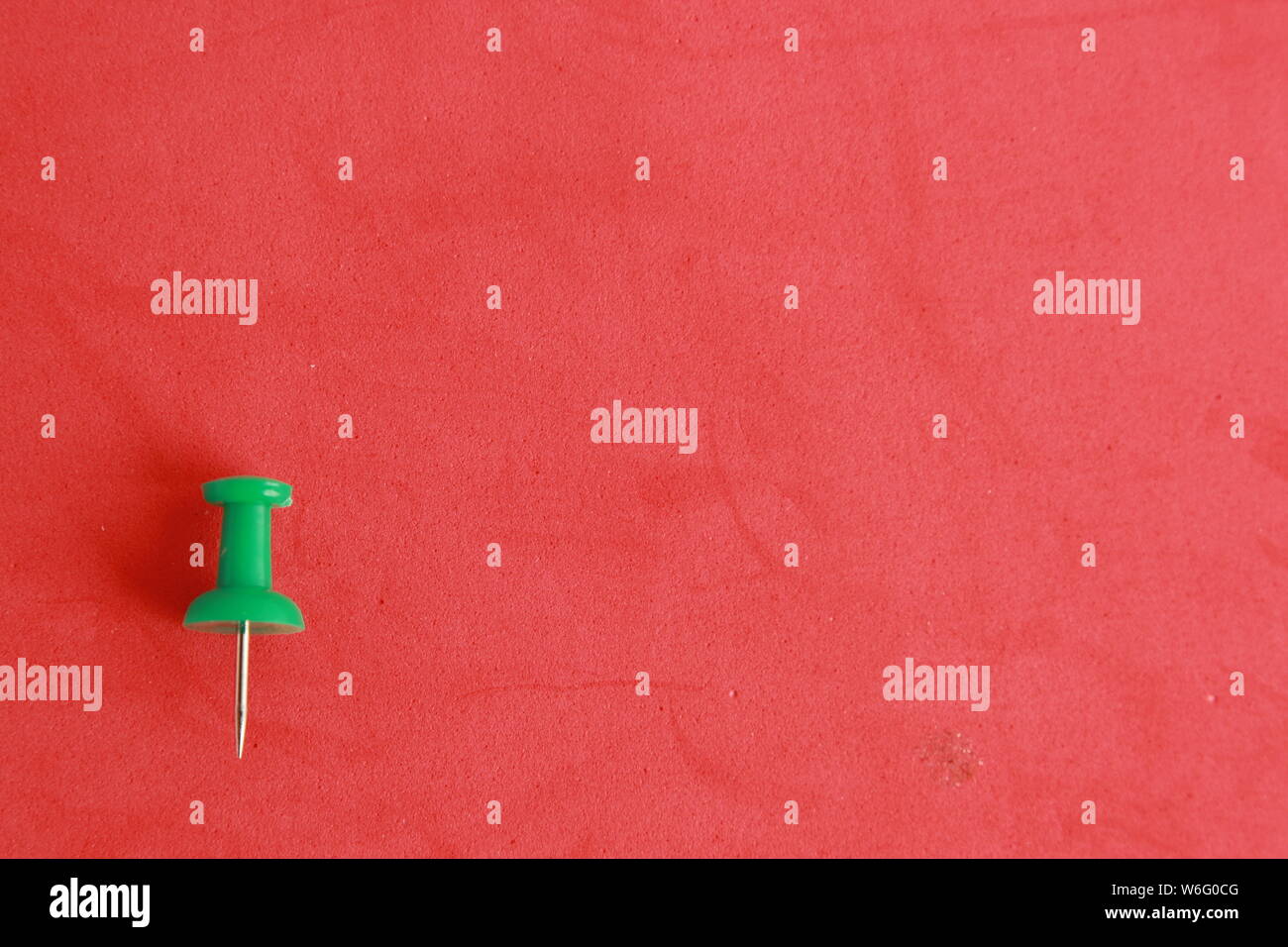 plastic thumbtacks in colorful background Stock Photo - Alamy