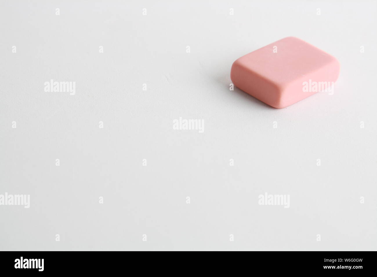 pink eraser on colorful background Stock Photo - Alamy