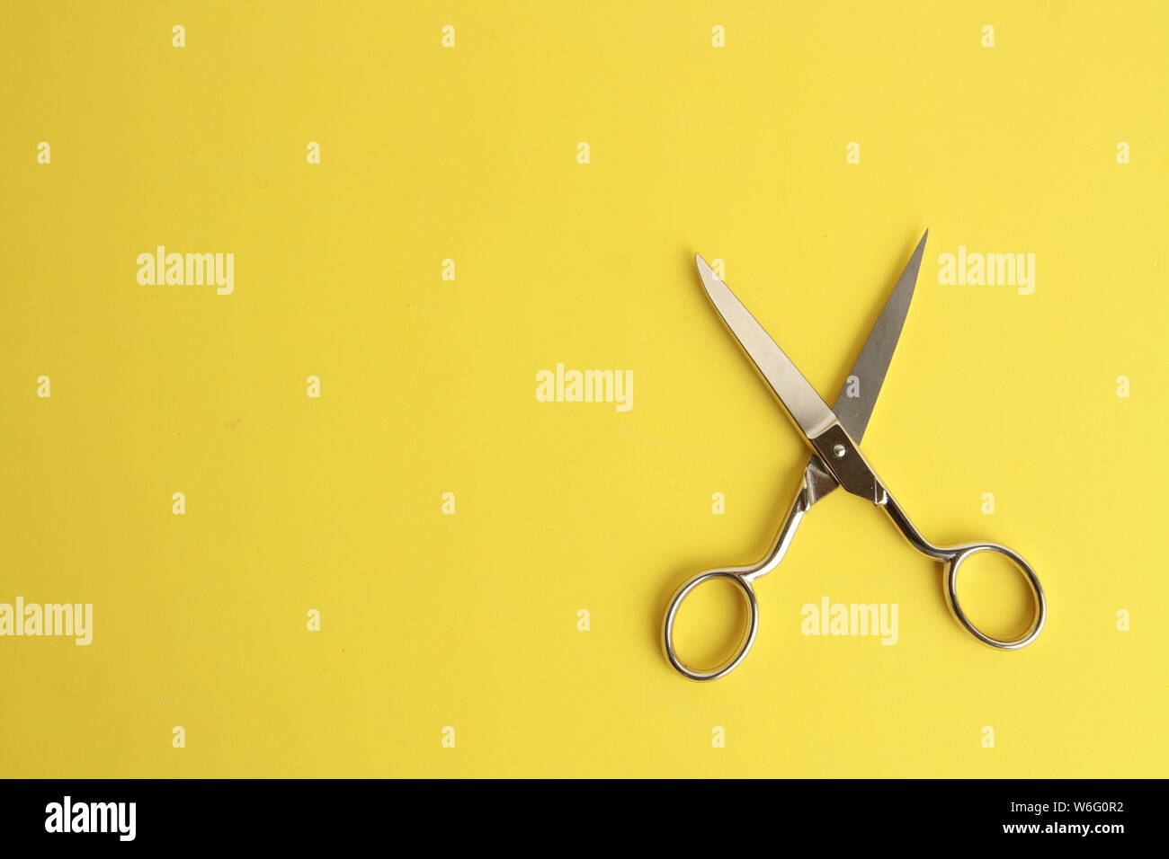 sewing scissors on colorful background Stock Photo - Alamy