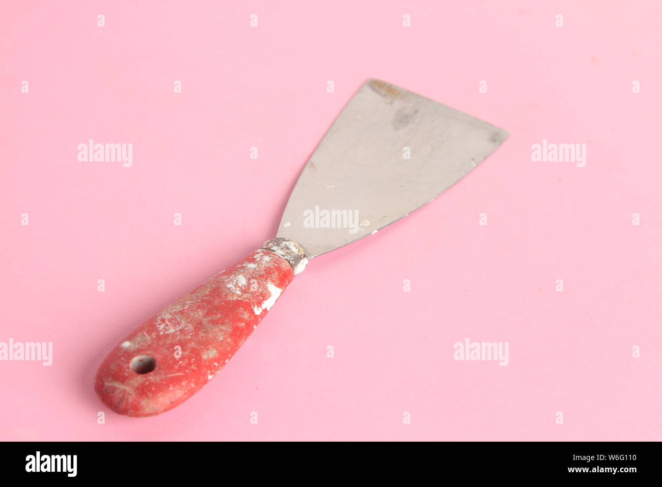 spatula of work used in colorful background Stock Photo - Alamy