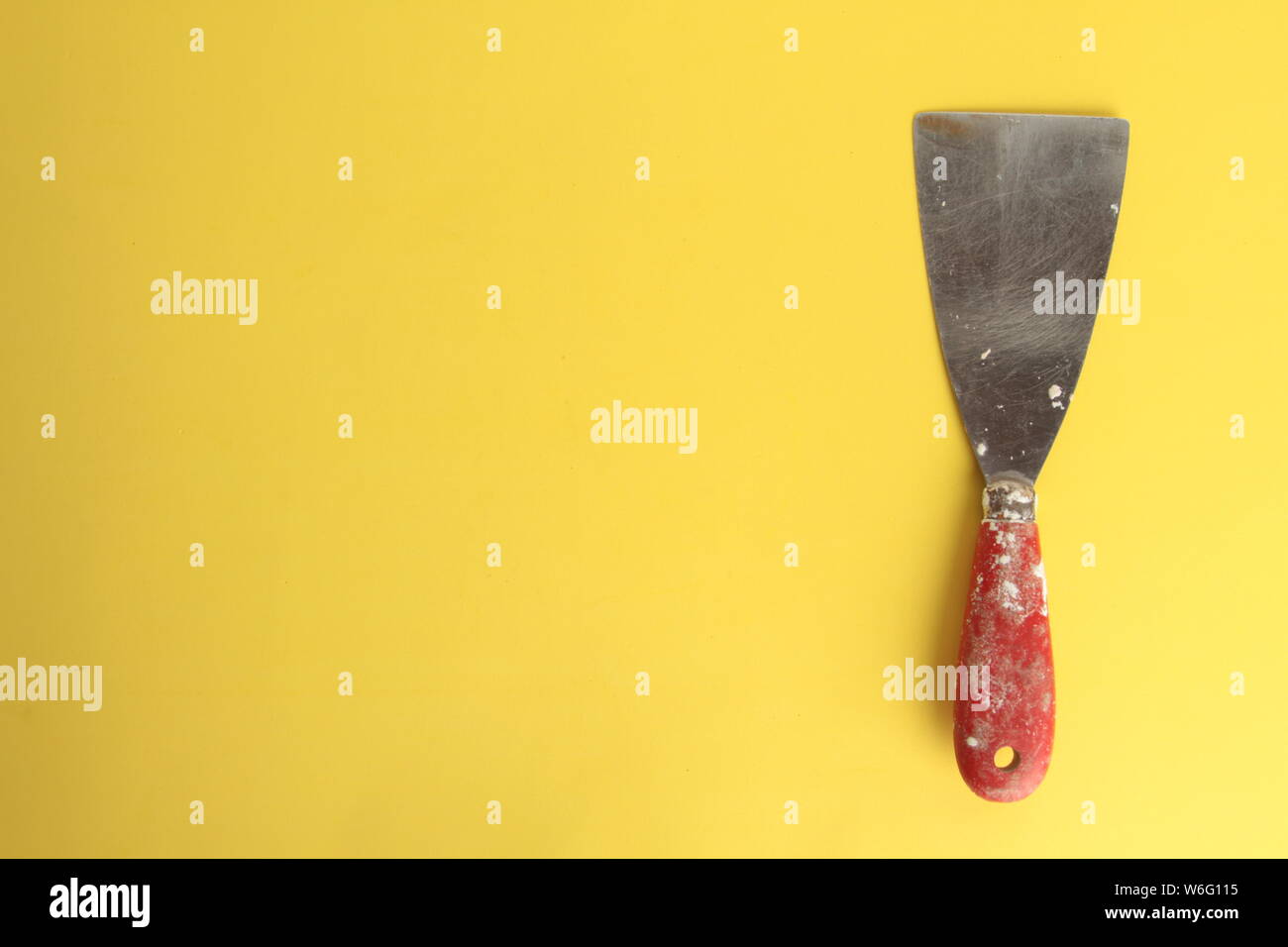 spatula of work used in colorful background Stock Photo - Alamy
